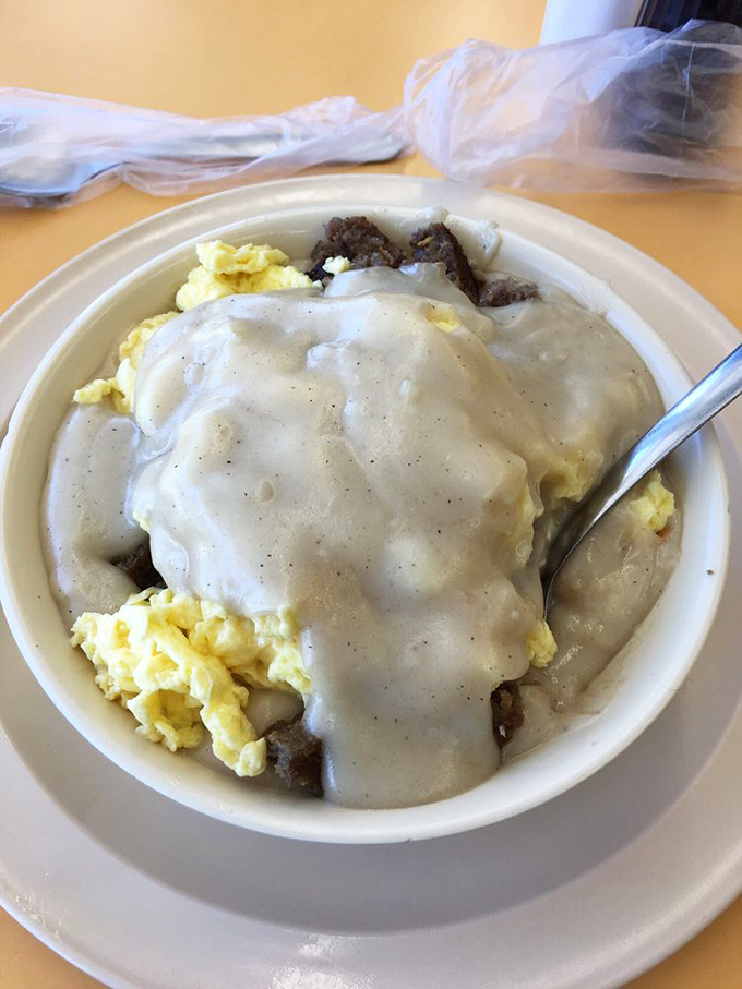 This isn't just biscuits and gravy—it's a warm, peppery hug in a bowl that makes you forget all your troubles until at least lunchtime.