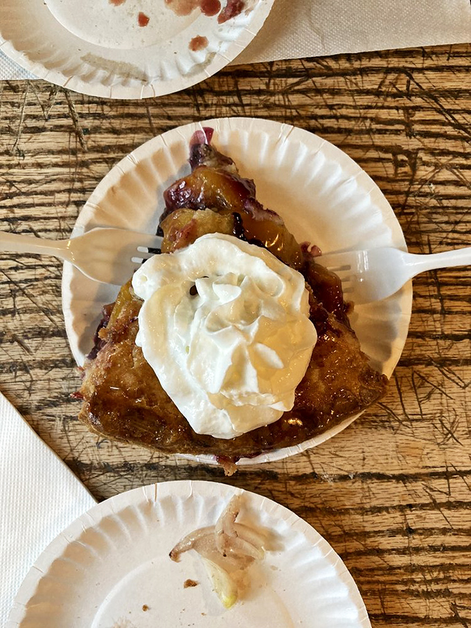 Pie à la mode that makes you want to write poetry. The whipped cream melts into warm fruit like a sweet, edible snowcap on a mountain of flavor.