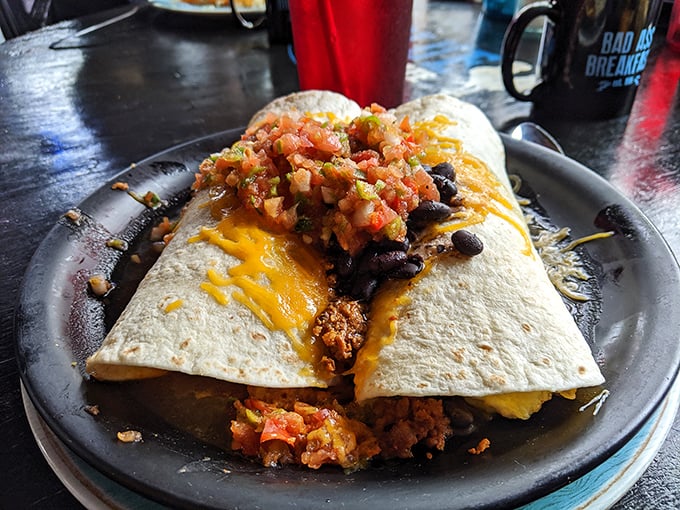 This breakfast burrito doesn't just satisfy hunger—it abolishes it, with melted cheese, black beans, and fresh salsa creating flavor in every bite.