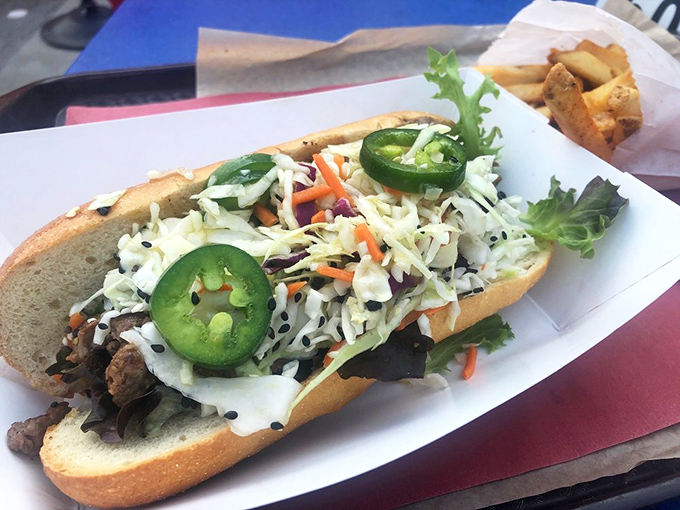 East meets Midwest in spectacular fashion. This Bulgogi Banh Mi sandwich proves that cultural fusion isn't just a concept—it's a delicious reality at Hi-Pointe.