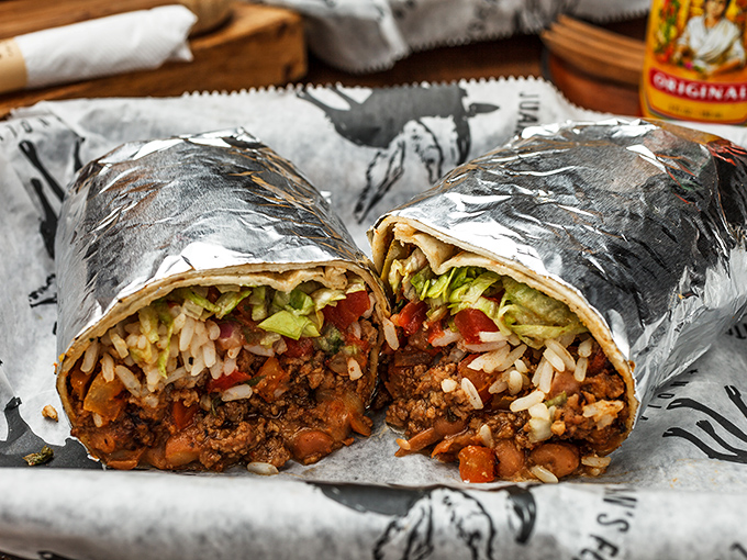 This isn't just a burrito—it's a silver-wrapped flavor bomb where rice, beans, and seasoned meat achieve the perfect balance of power in every bite.