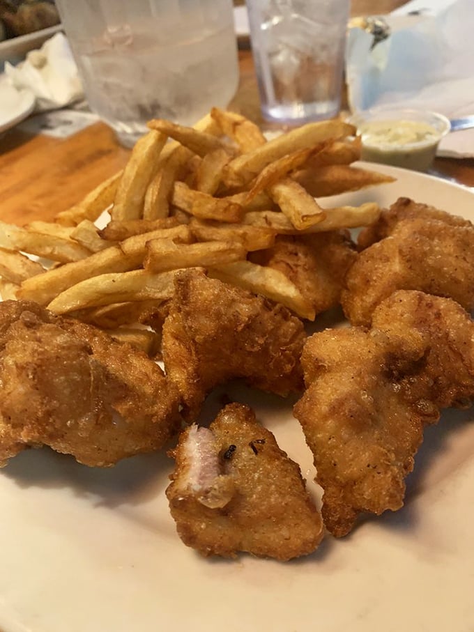Crispy catfish that shatters with each bite, paired with golden fries – proof that sometimes the simplest preparations yield the most satisfaction.