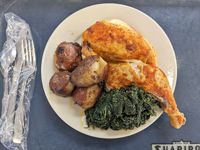 This chicken dinner isn't just comfort food; it's a warm embrace on a plate, complete with spinach and potatoes done right.