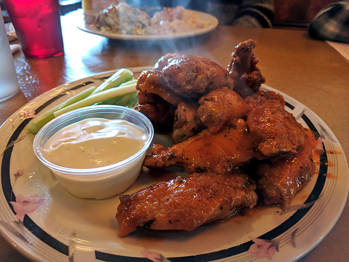 These wings aren't trying to be trendy—they're just perfectly crispy, saucy, and served with the confidence of something that needs no introduction.