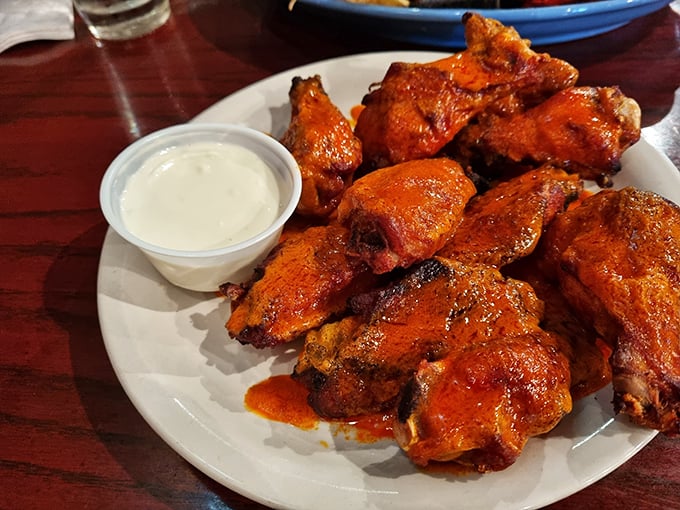 Wings that prove Roland's isn't just about seafood – these fiery beauties would make Buffalo natives nod in respectful approval.
