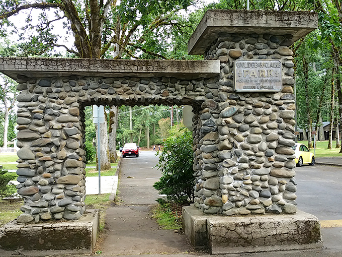 This stone archway to Coolidge McClaine Park isn't just an entrance – it's a portal to simpler times when parks were the original social network.
