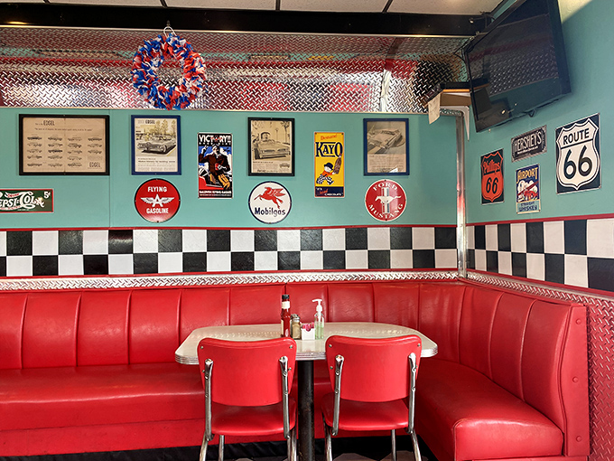 This corner booth has probably witnessed first dates, family celebrations, and road trip pit stops. The red vinyl has stories to tell. 