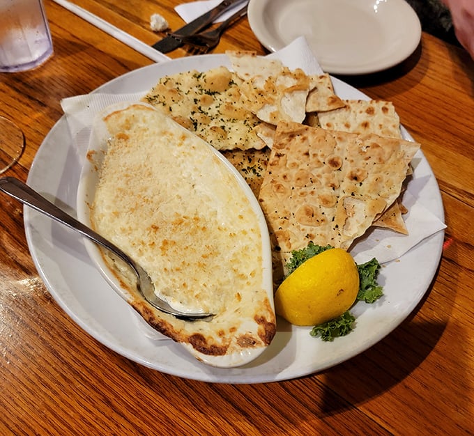 This bubbling crab dip might just be the most compelling reason to order another round and stay awhile longer.