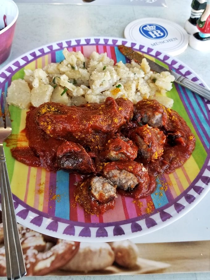 Currywurst with potato salad—a Berlin street food classic that's found a happy retirement home in Florida. That sauce has stories to tell.