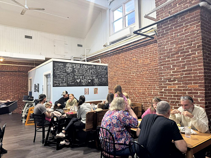 The weekend breakfast crowd at Gracie's isn't just eating—they're participating in a community tradition that brings together families, friends, and food.