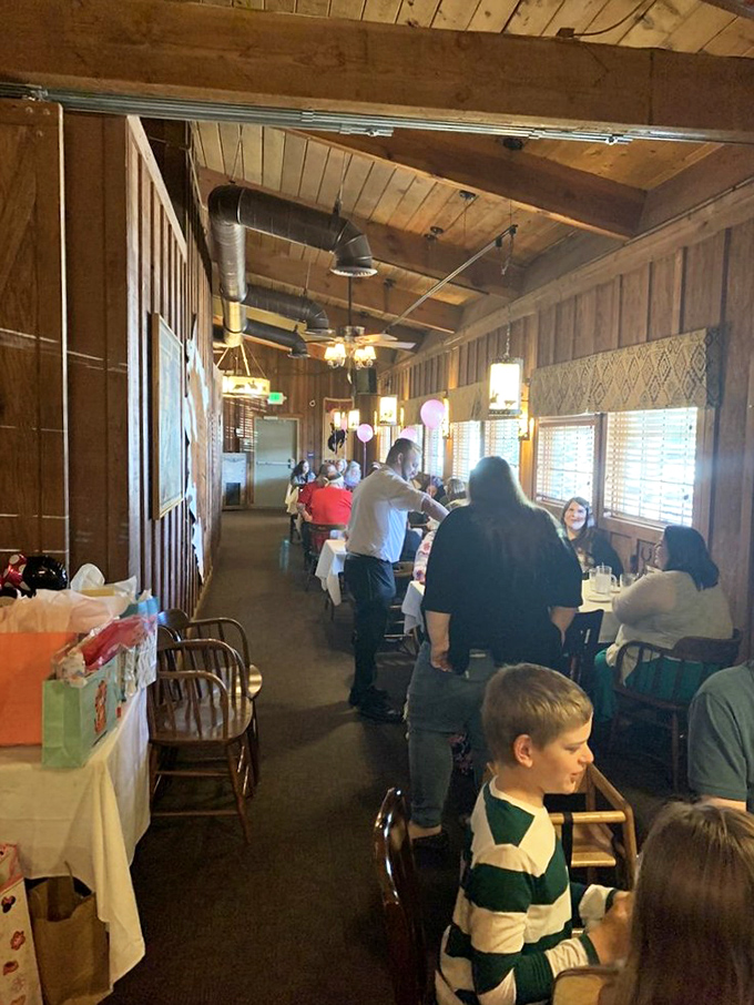 The dining room buzzes with the universal language of satisfaction. Special occasions feel more special when celebrated over perfectly cooked beef.