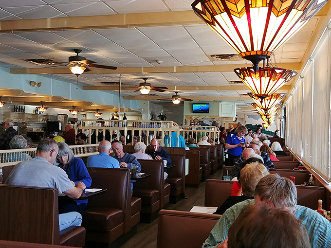 A dining room filled with regulars who've discovered what you're just learning – this place serves the kind of food worth building your morning around.