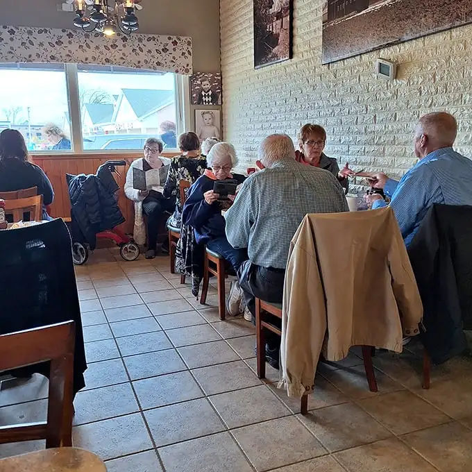 The morning crowd knows the secret – arrive early, come hungry, and bring friends who understand that good conversation pairs perfectly with great food.