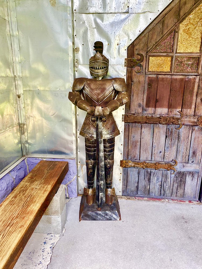The castle entrance beckons with whimsical guardians and lime-green benches that suggest this isn't your typical stuffy historical tour.