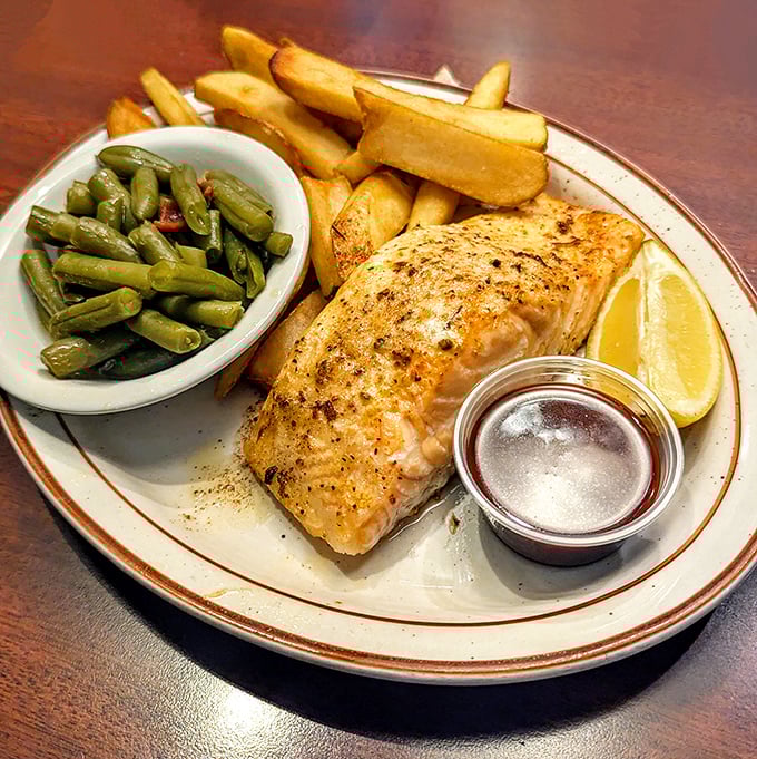 This salmon isn't trying to reinvent the wheel—it's just perfectly executing the classics with green beans that actually taste like vegetables should.