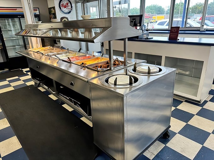 The steam table stands ready for lunch service—a gleaming promise of Southern comfort food that will make you forget all about counting calories.