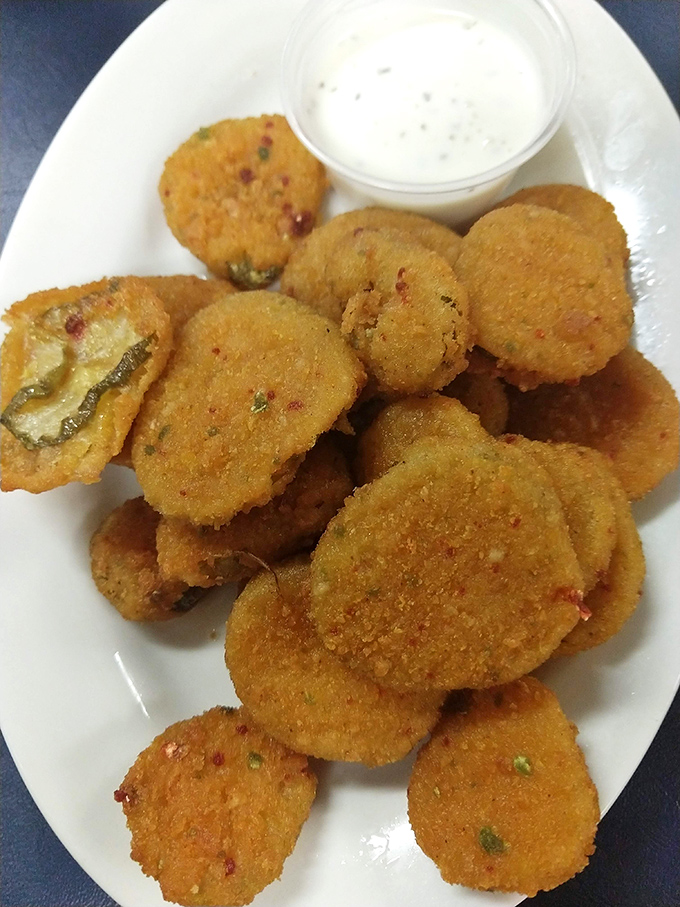 Fried pickles—crispy, tangy perfection that makes you wonder why anyone bothers with fancy appetizers. The ranch dipping sauce is non-negotiable.