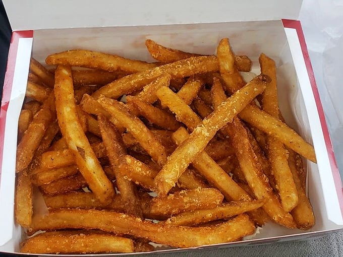 These aren't just fries—they're crispy, golden supporting actors in the culinary blockbuster starring that legendary fried chicken.
