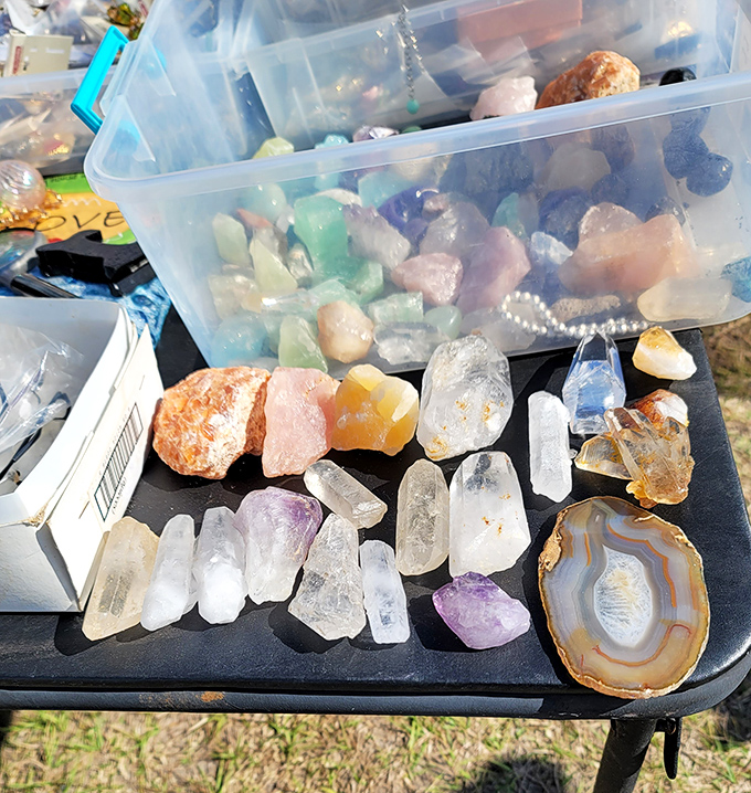 Earth's treasures catch the Florida sunlight. These crystals and geodes traveled millions of years and thousands of miles to reach this humble folding table.