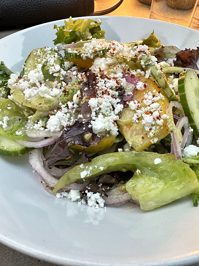 A salad that doesn't apologize for being healthy. Fresh greens, vibrant vegetables, and feta that adds just the right amount of sass.