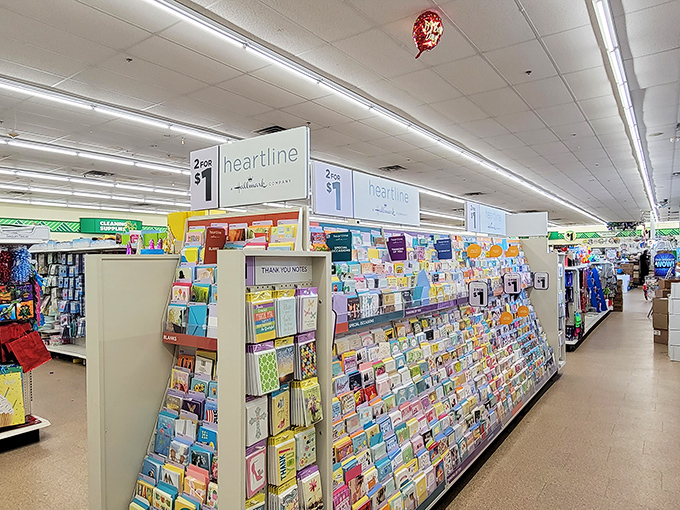 The greeting card section—proof that expressing heartfelt sentiments doesn't require taking out a small loan.