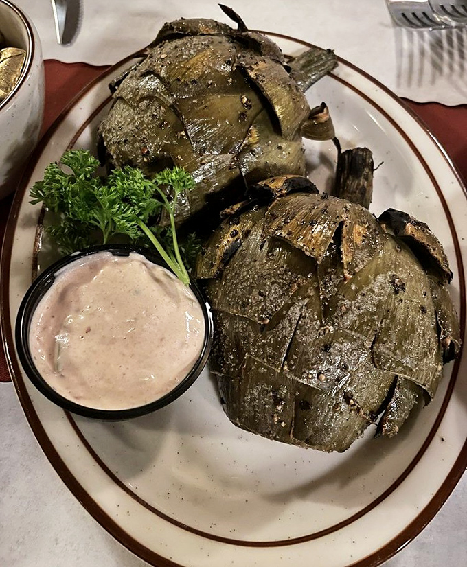 Grilled artichokes that celebrate California's agricultural bounty with smoky, tender perfection that melts in your mouth.