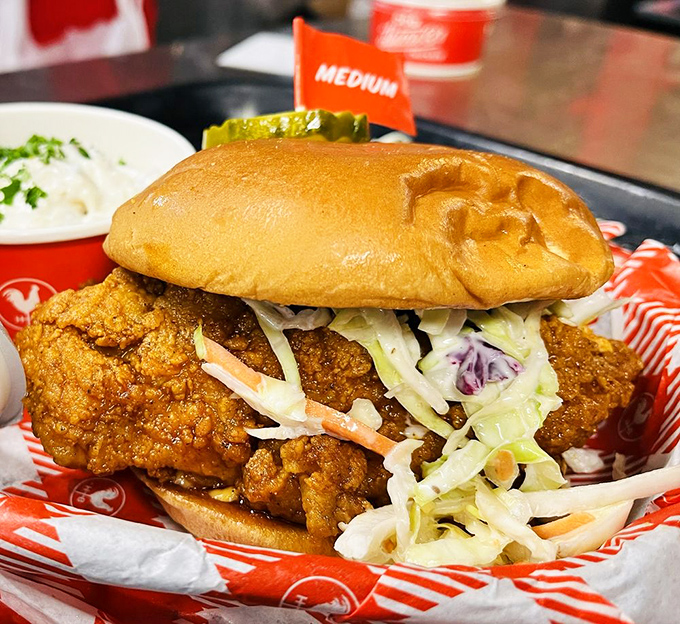 A more manageable way to experience the burn. This sandwich balances crispy chicken, cooling slaw, and comeback sauce in perfect harmony.