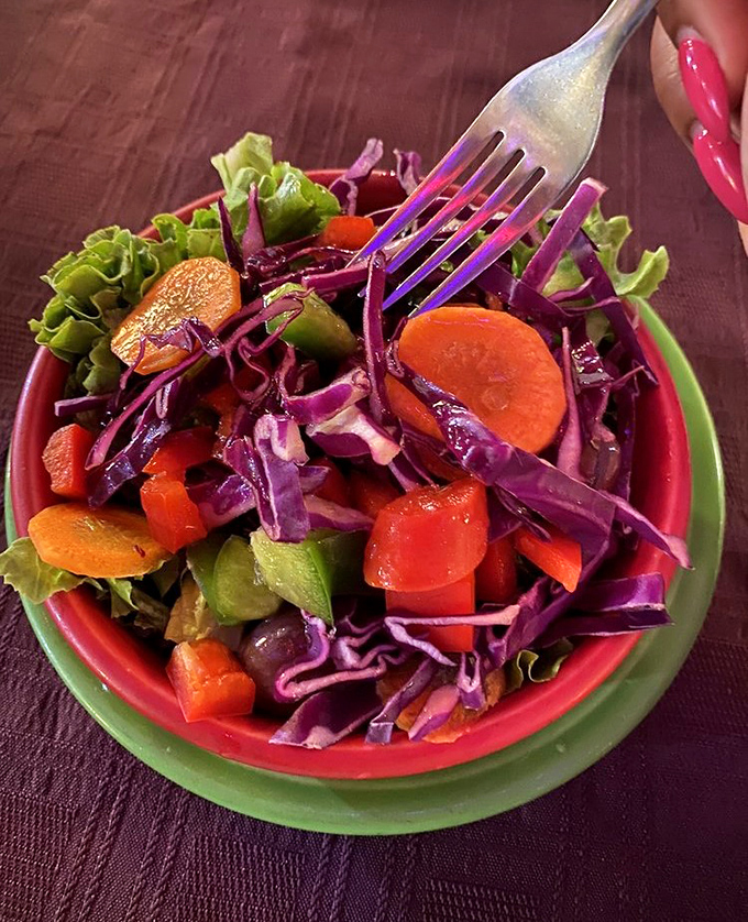 A symphony of purple cabbage and bright carrots—proof that vegetarian eating is about adding color to your life, not subtracting options.
