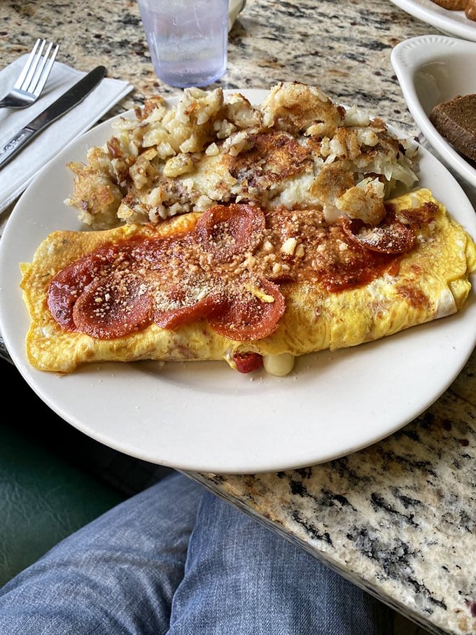 This omelet didn't just incorporate pepperoni—it embraced it wholeheartedly. Those home fries are the unsung heroes of the breakfast plate.