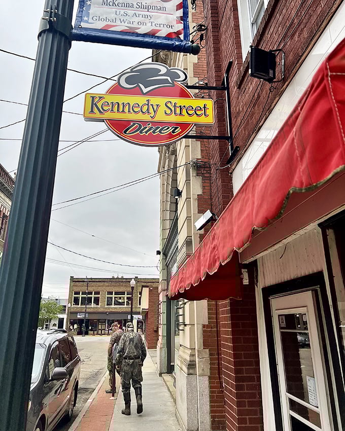 The Kennedy Street Diner sign promises comfort food in a classic setting, where breakfast specials come with a side of local conversation.