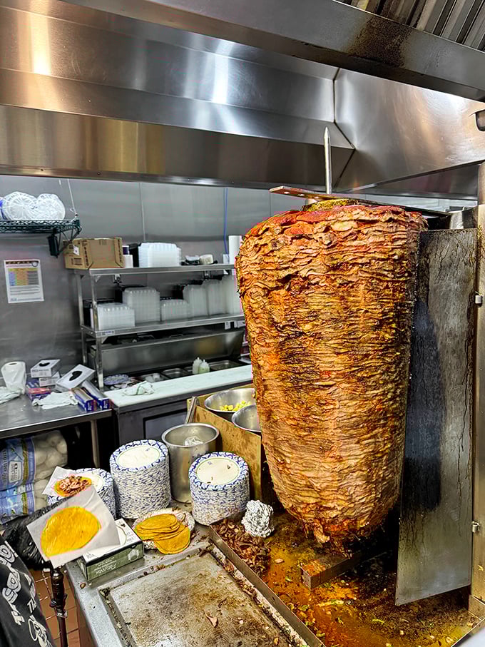 The trompo—a spinning tower of marinated pork that hypnotizes you while it slowly roasts to caramelized perfection.