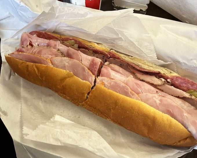 This Italian hoagie isn't just a sandwich – it's an engineering achievement where bread serves as structural support for a meat skyscraper.