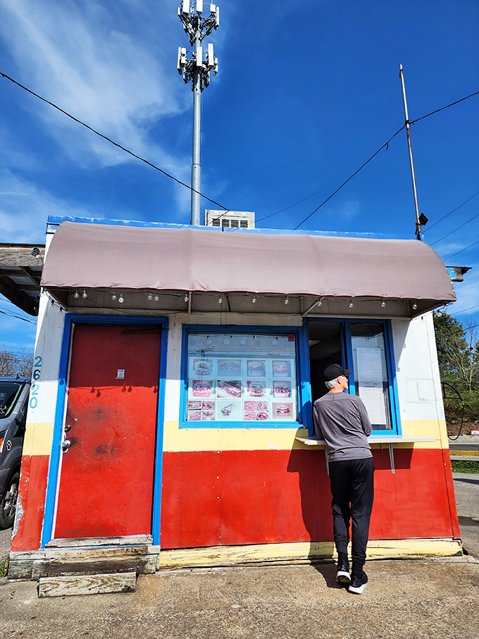 The moment of anticipation at Fat Mo's ordering window. Like Christmas morning for your stomach, but with better food.