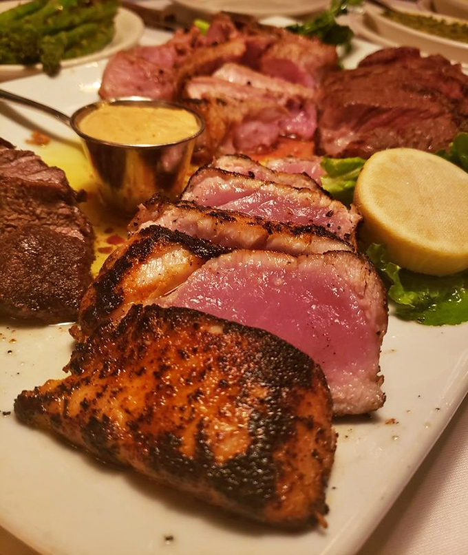 Tuna steak that makes you forget beef exists for a moment. Perfectly seared on the outside, ruby-red within—the ocean's answer to the perfect steak.
