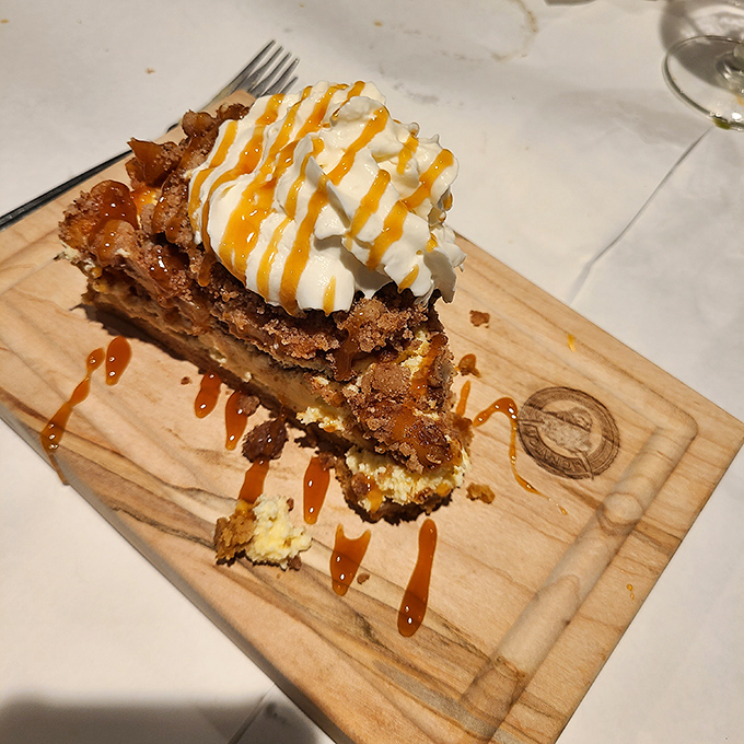Pecan pie that makes you question your loyalty to chocolate desserts. That caramel drizzle and whipped cream are just showing off. 