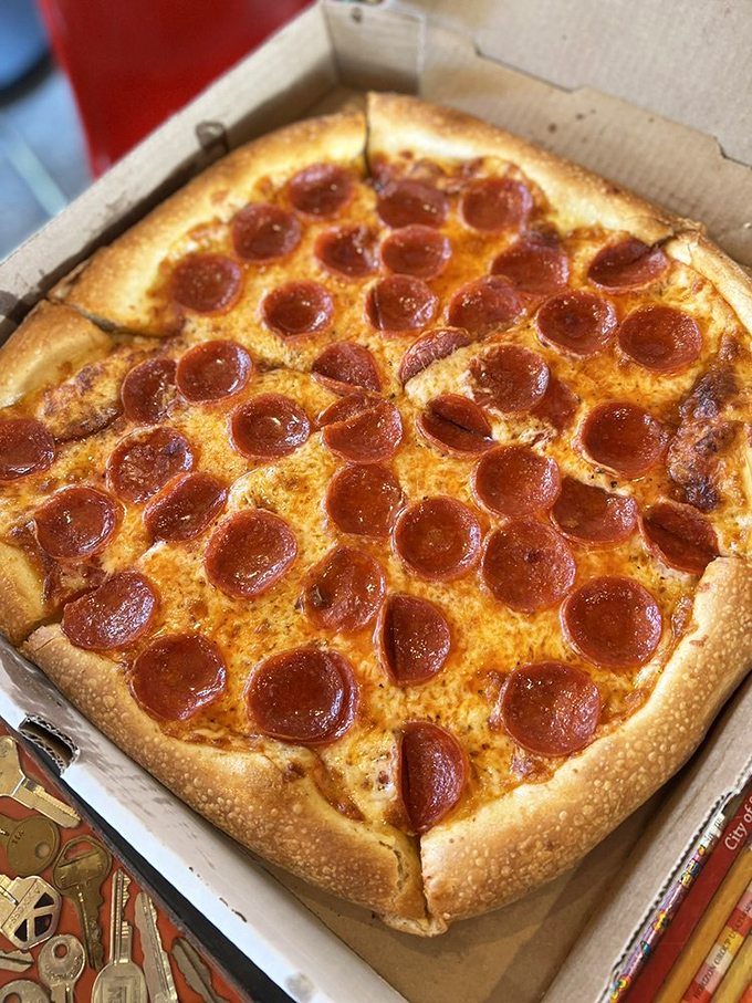 Pepperoni pizza perfection – each disc of pepperoni curled into a tiny flavor bowl collecting precious oils that infuse every heavenly bite.