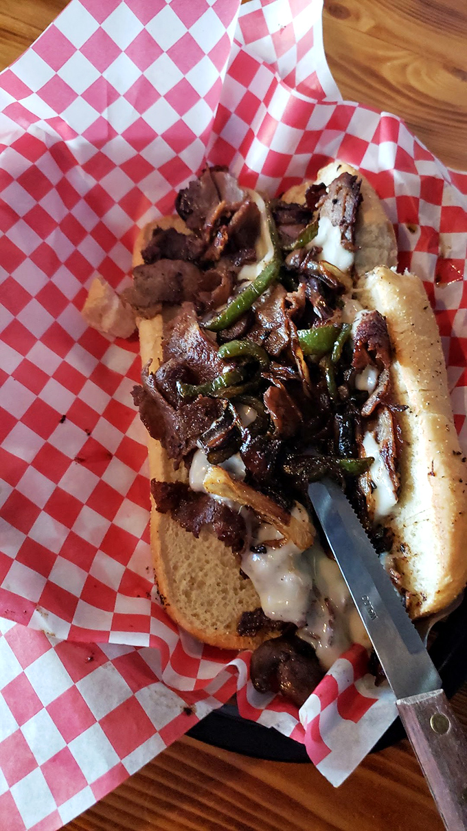 The Philly cheesesteak that would make a Pennsylvanian nod in approval. Those caramelized onions and peppers aren't just toppings—they're transformation.