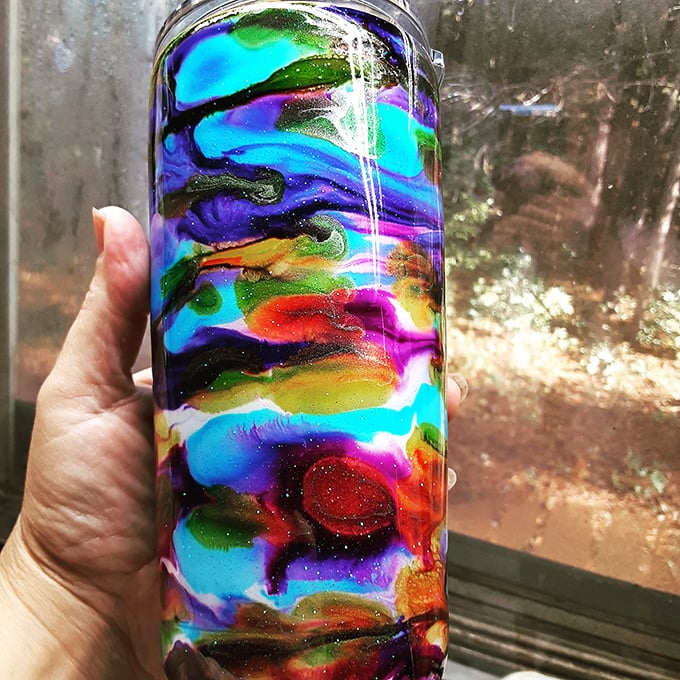Swirling colors trapped in glass—handcrafted artistry among mass-produced treasures. The perfect souvenir from your flea market adventure.