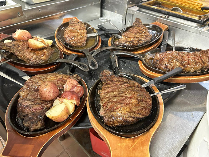 Sizzling rib-eyes in cast iron skillets prove The Old Fish House isn't just about seafood—these steaks could make a lobster jealous.