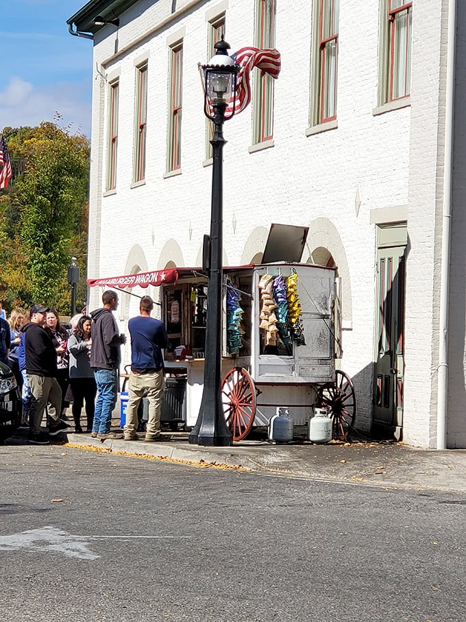 The Hamburger Wagon creates a Norman Rockwell-worthy scene against Miamisburg's historic downtown, complete with American flag and loyal patrons. 