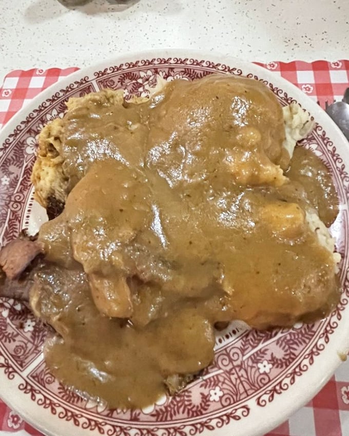 Roast beef swimming in rich gravy atop mashed potatoes—a plate that whispers "nap time" in the most delicious way possible.