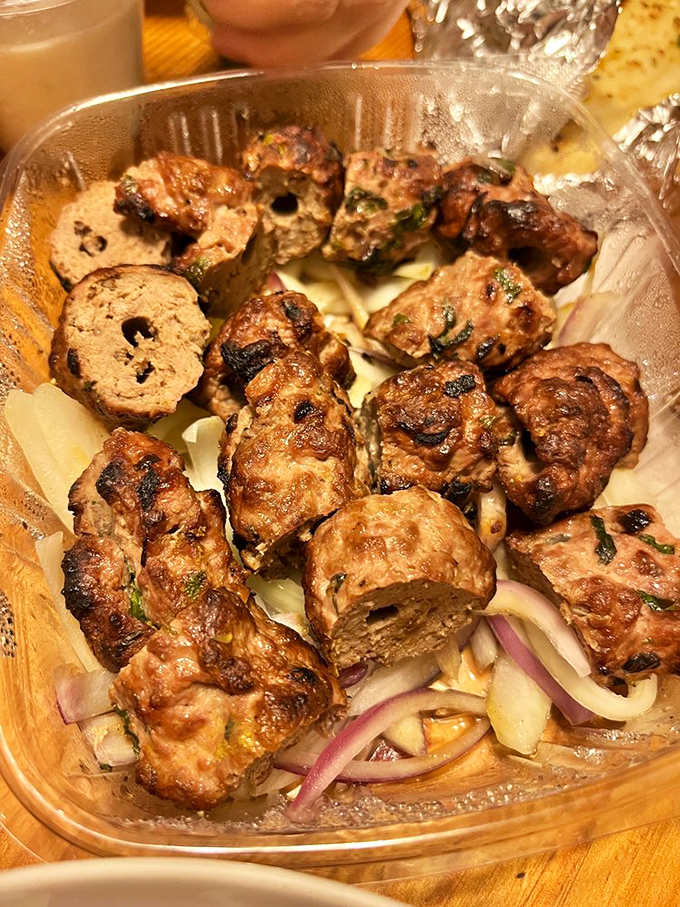 Seekh kabab—where ground meat meets fire and spice in a relationship that was clearly meant to be. Charred perfection.