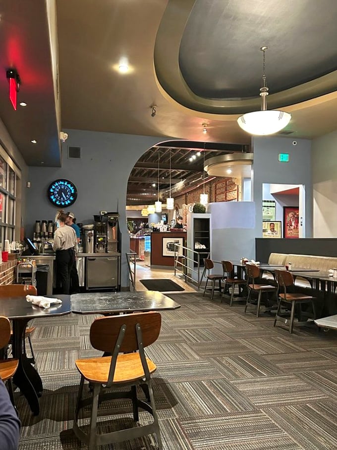 The modern, airy interior features curved archways and exposed brick—a thoughtful design that makes comfort food taste even better.