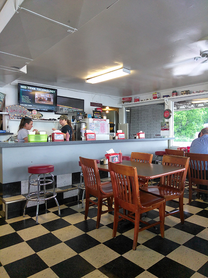 The counter—where regulars become family and first-timers become regulars. Coffee refills flow as freely as the conversation.