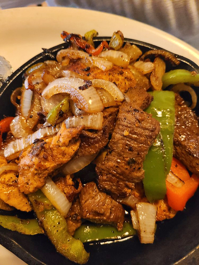 Fajitas that sizzle with purpose—each strip of meat and vegetable has accepted its delicious destiny to become your next perfect bite.