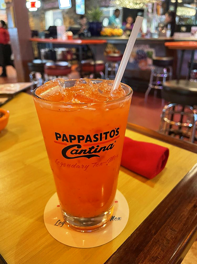 This strawberry lemonade isn't just a drink—it's summer in a glass, wearing the restaurant's logo like a proud badge of honor.