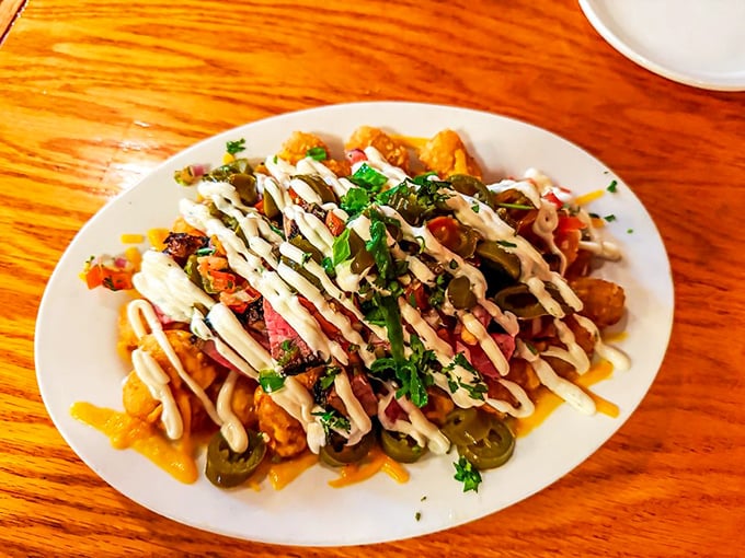 These loaded tots aren't just an appetizer – they're the opening act that sets the tone for the culinary concert to come.