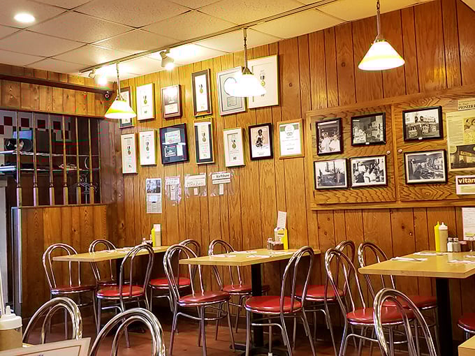 The wall of recognition showcases decades of history and community connection – a visual testament to Cecil's place in St. Paul's heart.