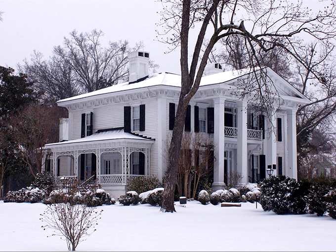Even under a blanket of snow, Abbeville's historic homes maintain their dignified Southern charm. Winter reveals architectural details hidden by summer foliage.