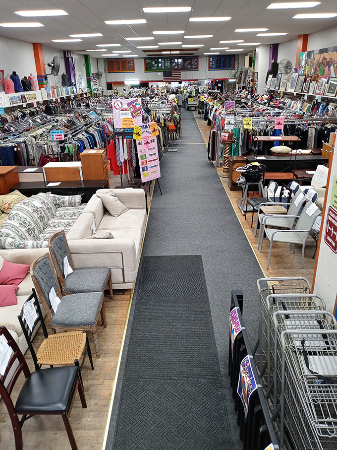 The wide center aisle serves as Main Street in this secondhand metropolis, with neighborhoods of clothing, furniture, and housewares branching off invitingly.
